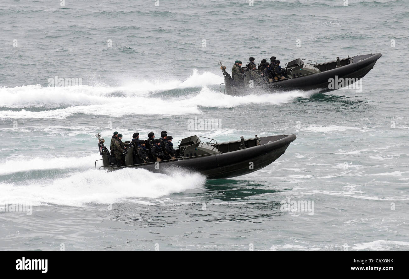 Royal Navy rapid response ribs, boat, speedboats carrying troops from ...