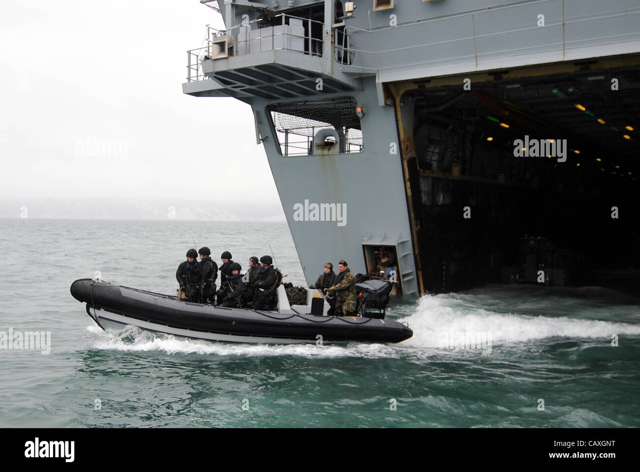 HMS Bulwark, Royal Navy flagship, Britain, UK, rib carrying troops ...