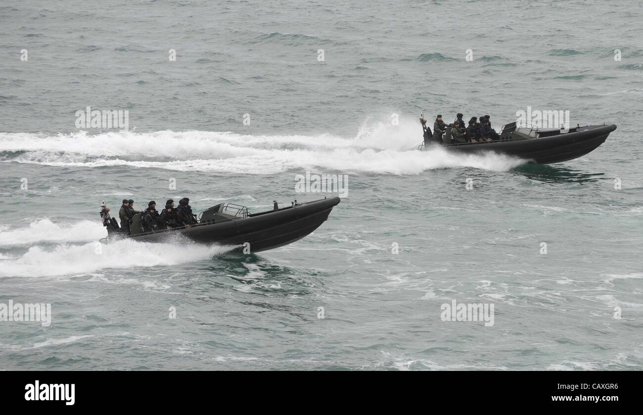Royal Navy rapid response ribs, boat, speedboats carrying troops from ...
