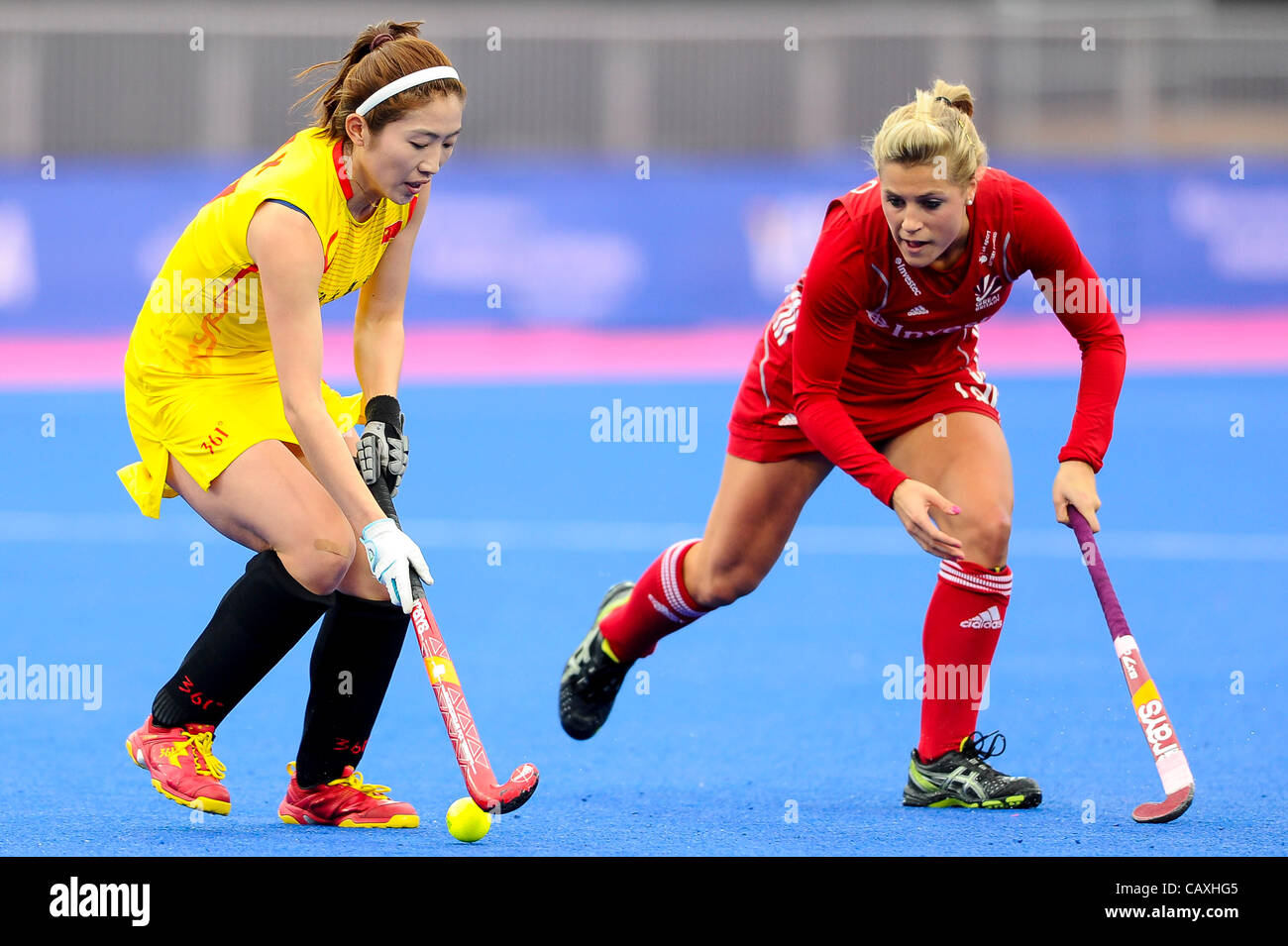 03.05.2012 London, England. China Midfielder # 17 Hongxia LI (CHN) and ...