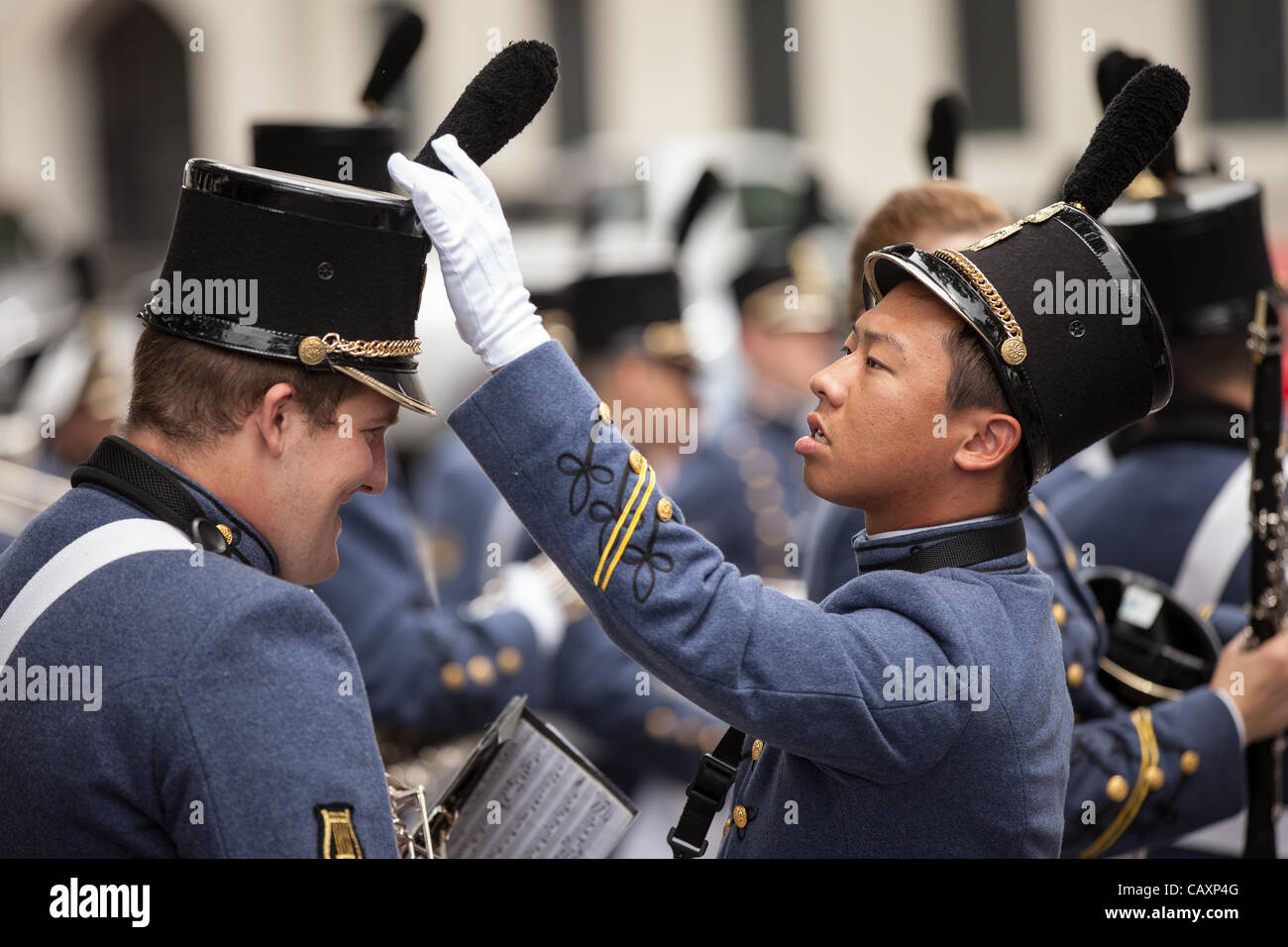 Undergraduates at the Citadel adjust their uniforms before the start of ...