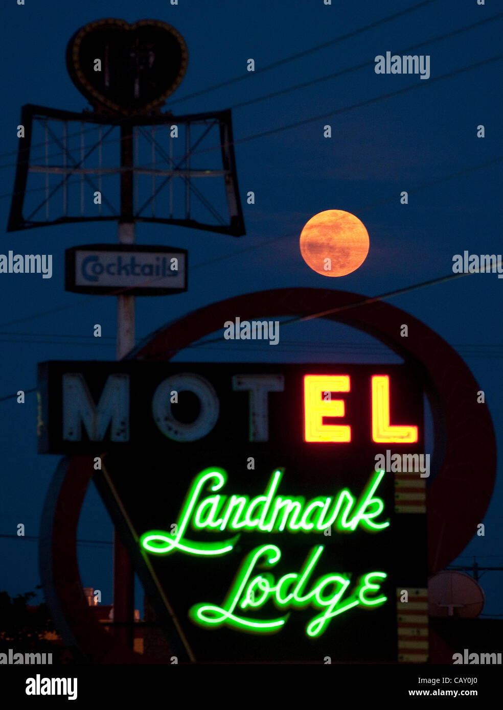 May 5, 2012 - Ft. Worth, Texas, U.S. - A super moon rises over neon ...