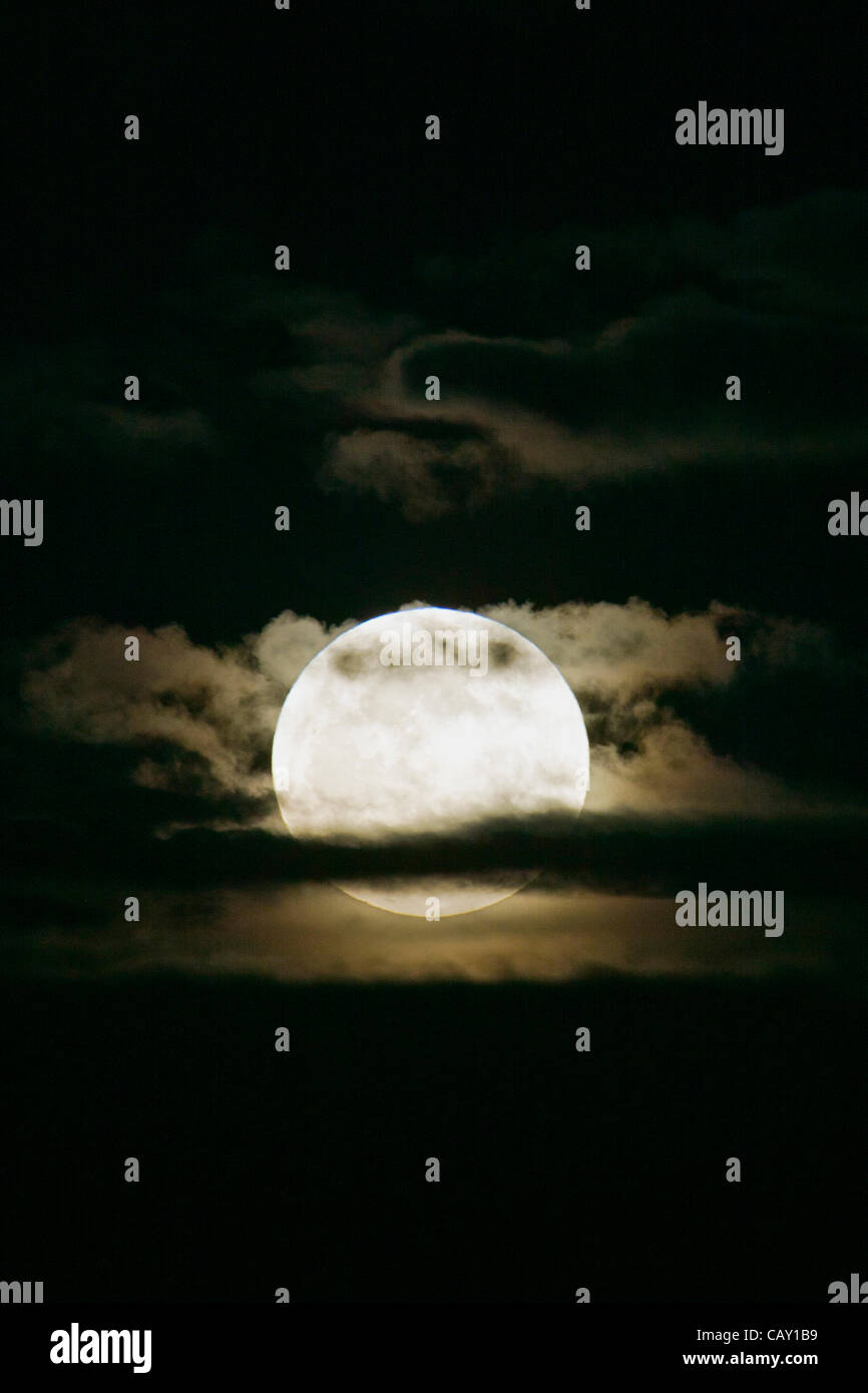 Perigree full moon, or supermoon, rises over Colorado, USA. Moon is ...