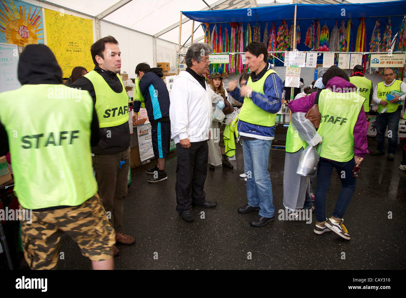Minamisanriku, Miyagi, Japan - Volunteers wear staff uniforms at ...