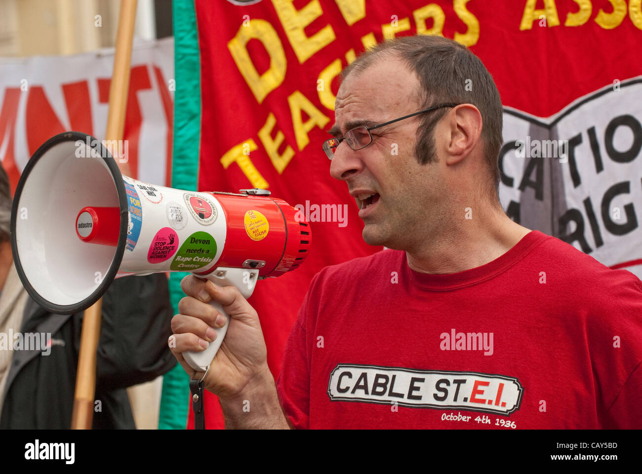 Mike Gurney speaking at Exeter Cathedral Yard as part of the May Day ...