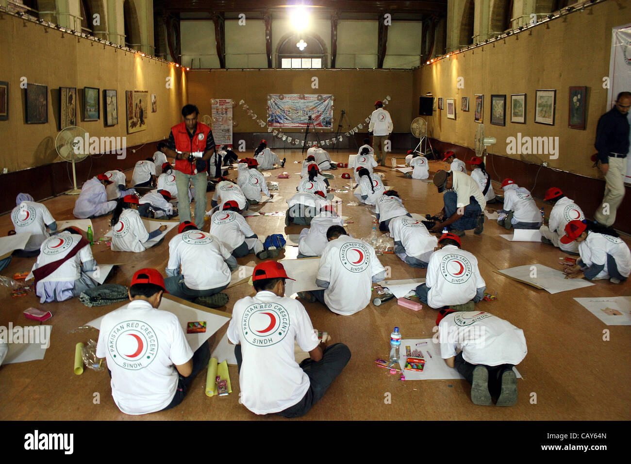 Students participate in a drawing competition organized by Pakistan Red ...