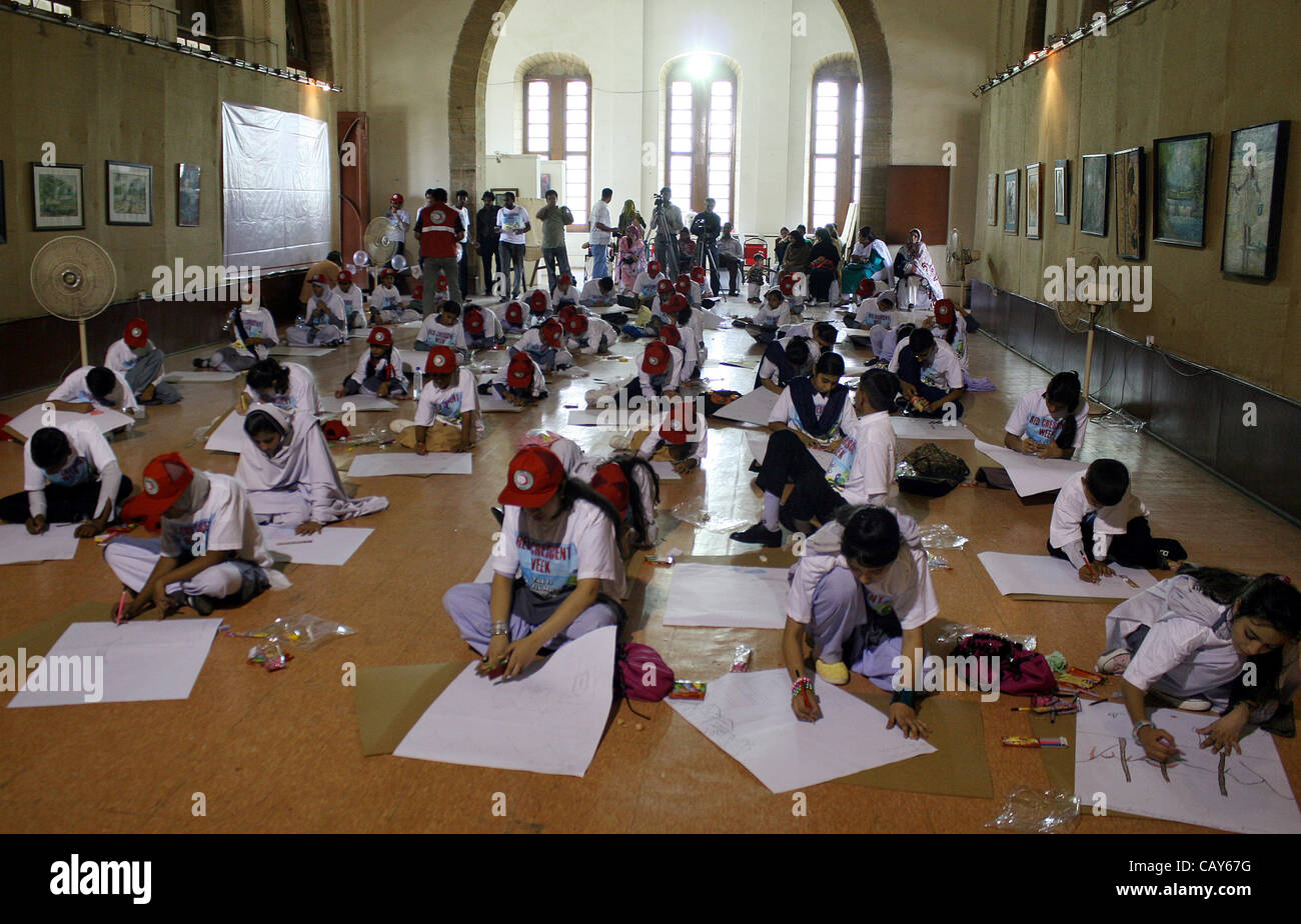 Students participate in a drawing competition organized by Pakistan Red ...