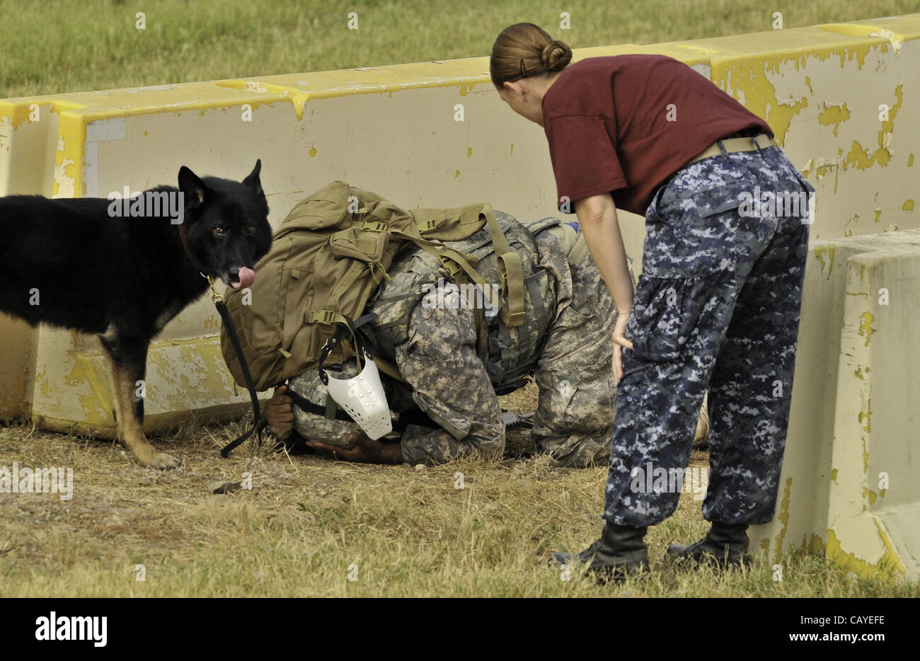 May 5, 2012 - A soldier is given encouragement by a commrade while ...