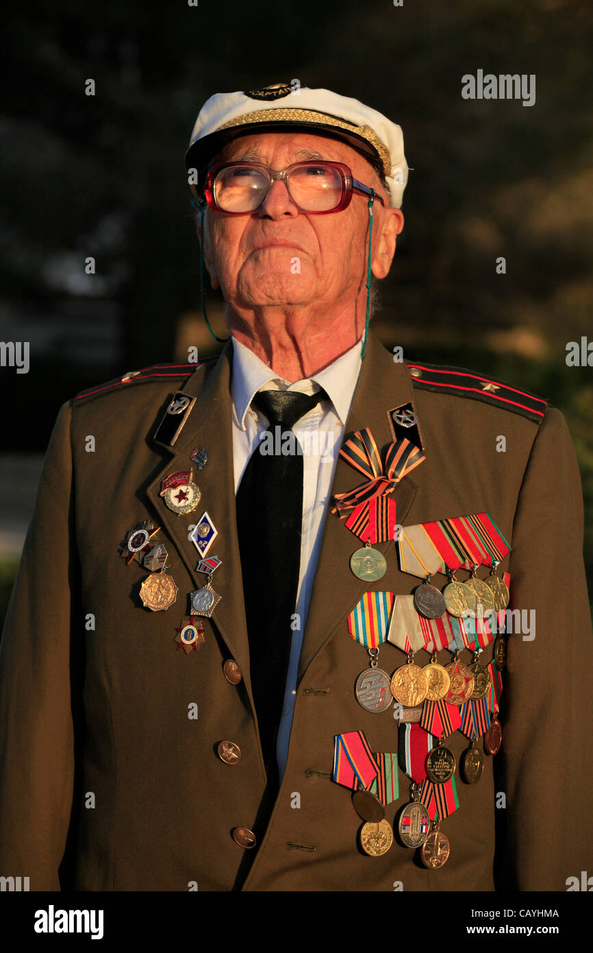 A soviet Jewish World War II veteran with medals pinned in his old ...