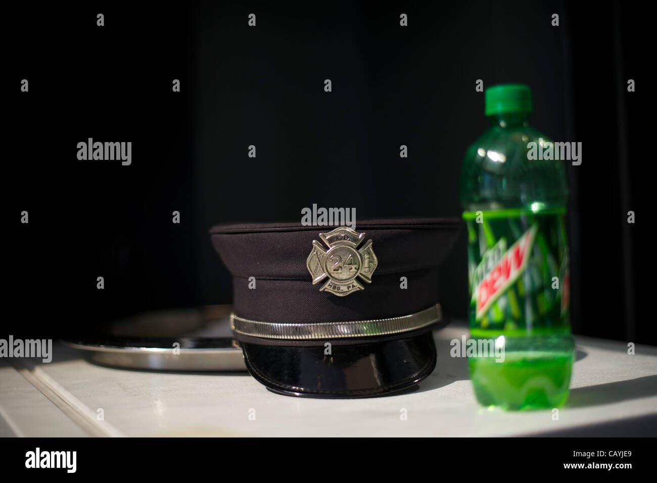 A fire department hat is laid atop a table while Republican ...