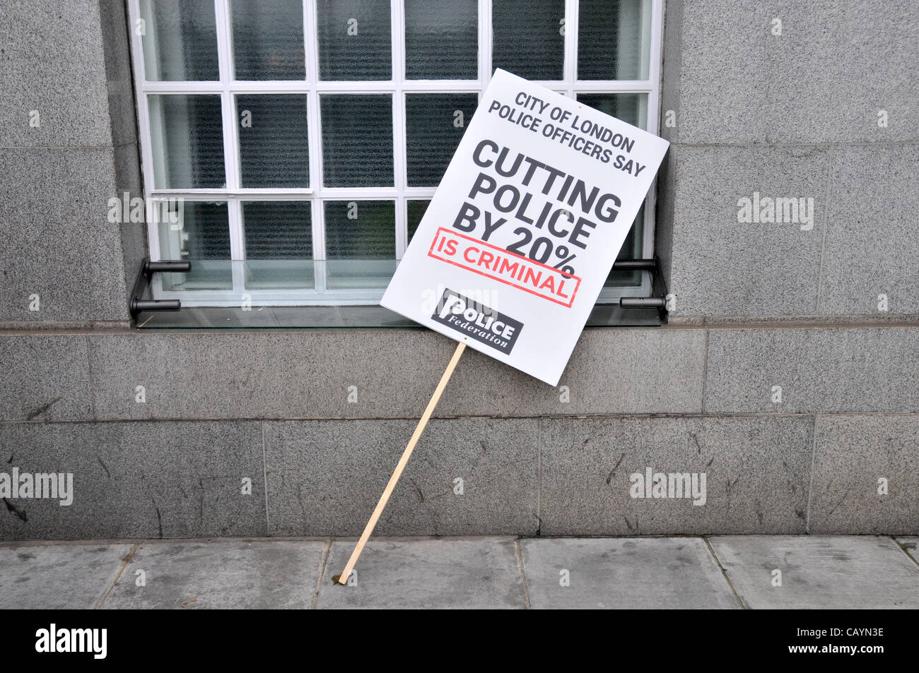 A banner for City of London Police officers with the slogan'Cutting ...