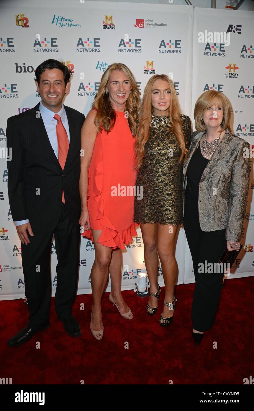 Robert Sharenow, Nancy Dubuc, Lindsay Lohan, Abbe Raven at a public ...