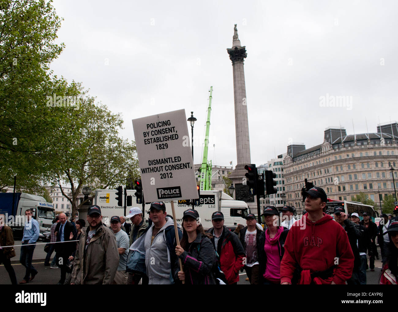 London, UK. 10/05/12. Police marching around Trafalgar Square during ...