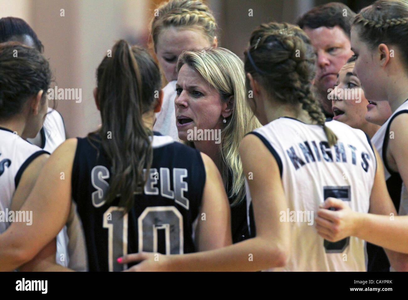 Steele huddles in the last set with Coach Cathy Glunt. Steele plays New ...