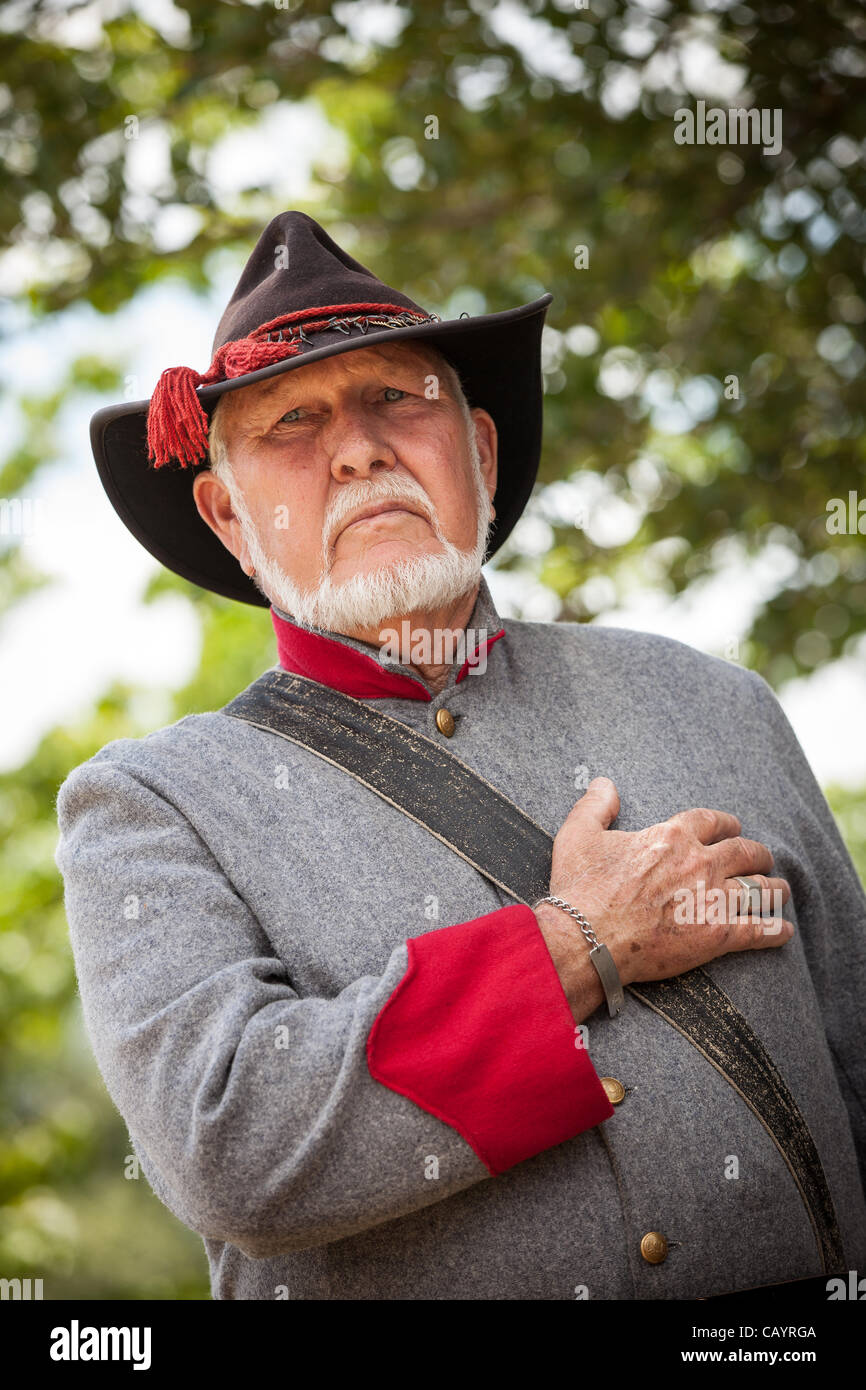 A historic re-enactor stands during the pledge at a ceremony in honor ...