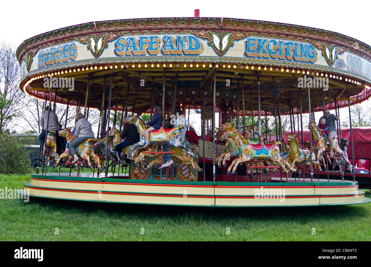 A carousel at stotfold mill country fair Stock Photo - Alamy