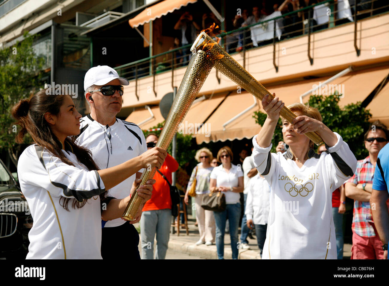 The Olympic flame arrives in Thessaloniki. The torchbearer, Yota ...