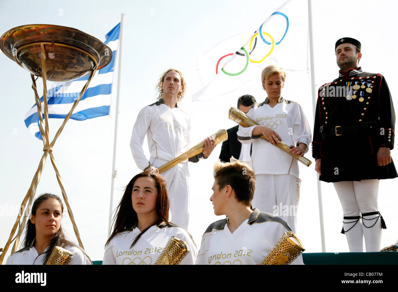 The Olympic flame arrives in Thessaloniki. The torchbearer, Yota ...