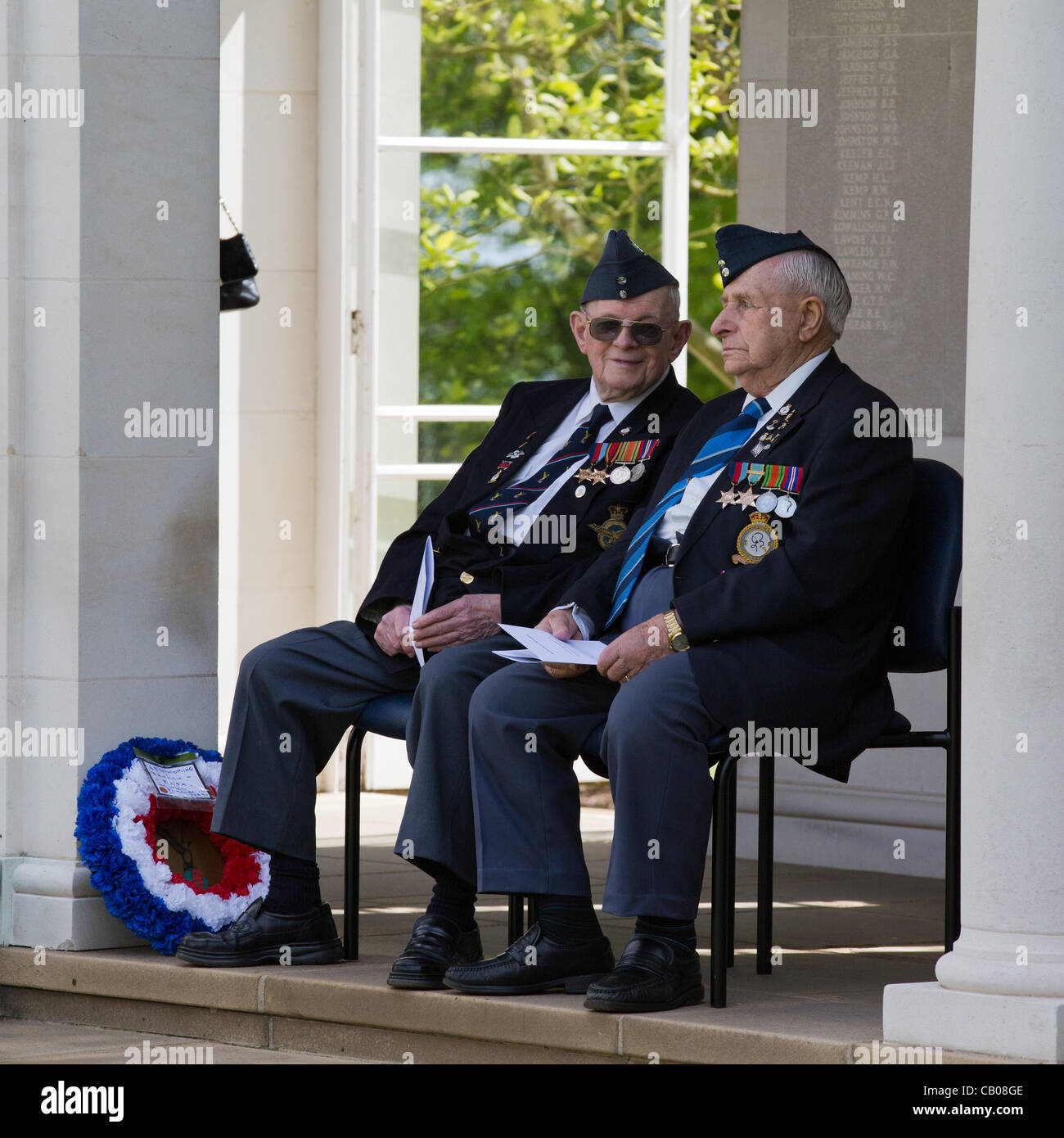 Decorated Royal Air Force veterans seated in the cloister of the ...