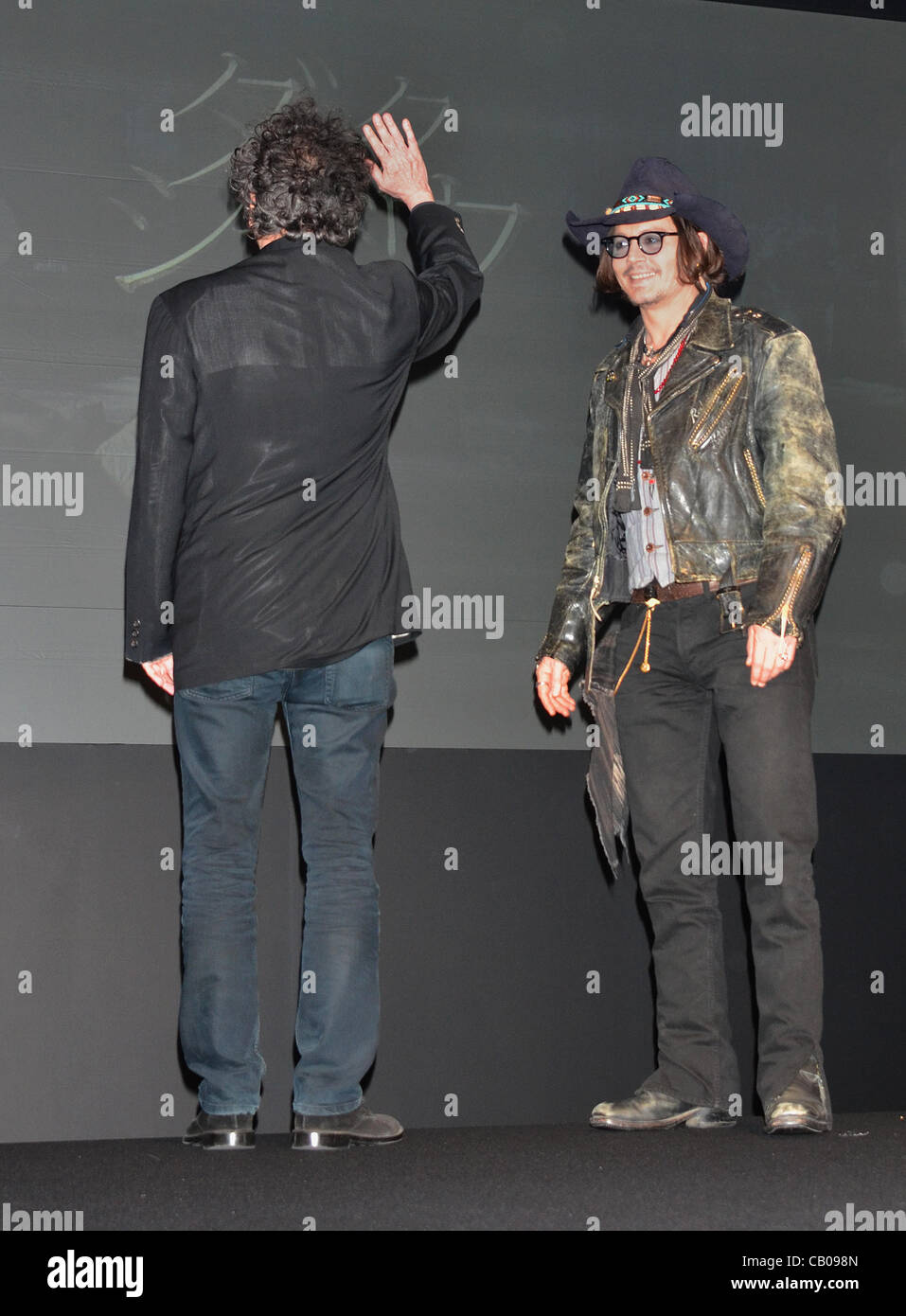 May 13, 2012, Tokyo, Japan - Movie director Tim Burton, left, clowns as ...