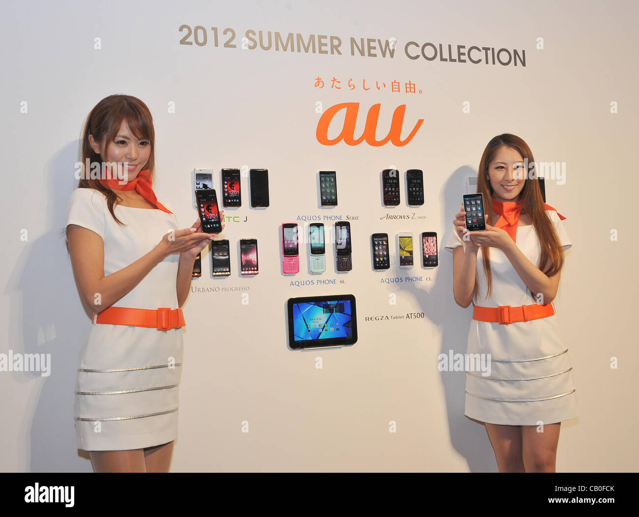 May 15, 2012, Tokyo, Japan - Models show off KDDIs new lineup of mobile ...