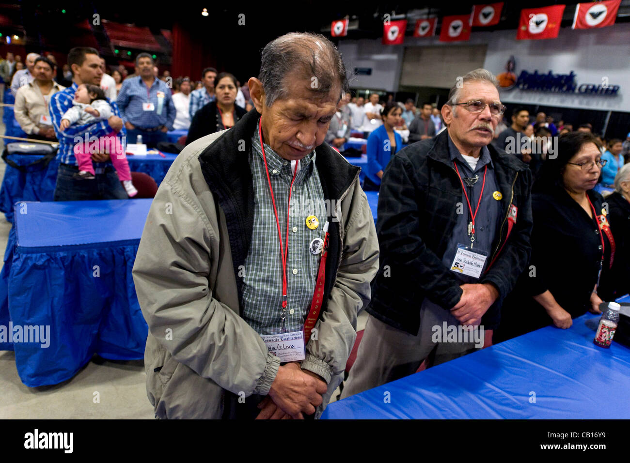Delegates stand hi-res stock photography and images - Alamy