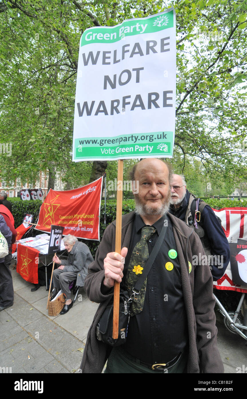 A Green Party protester attending the Stop the War and anti Nato ...