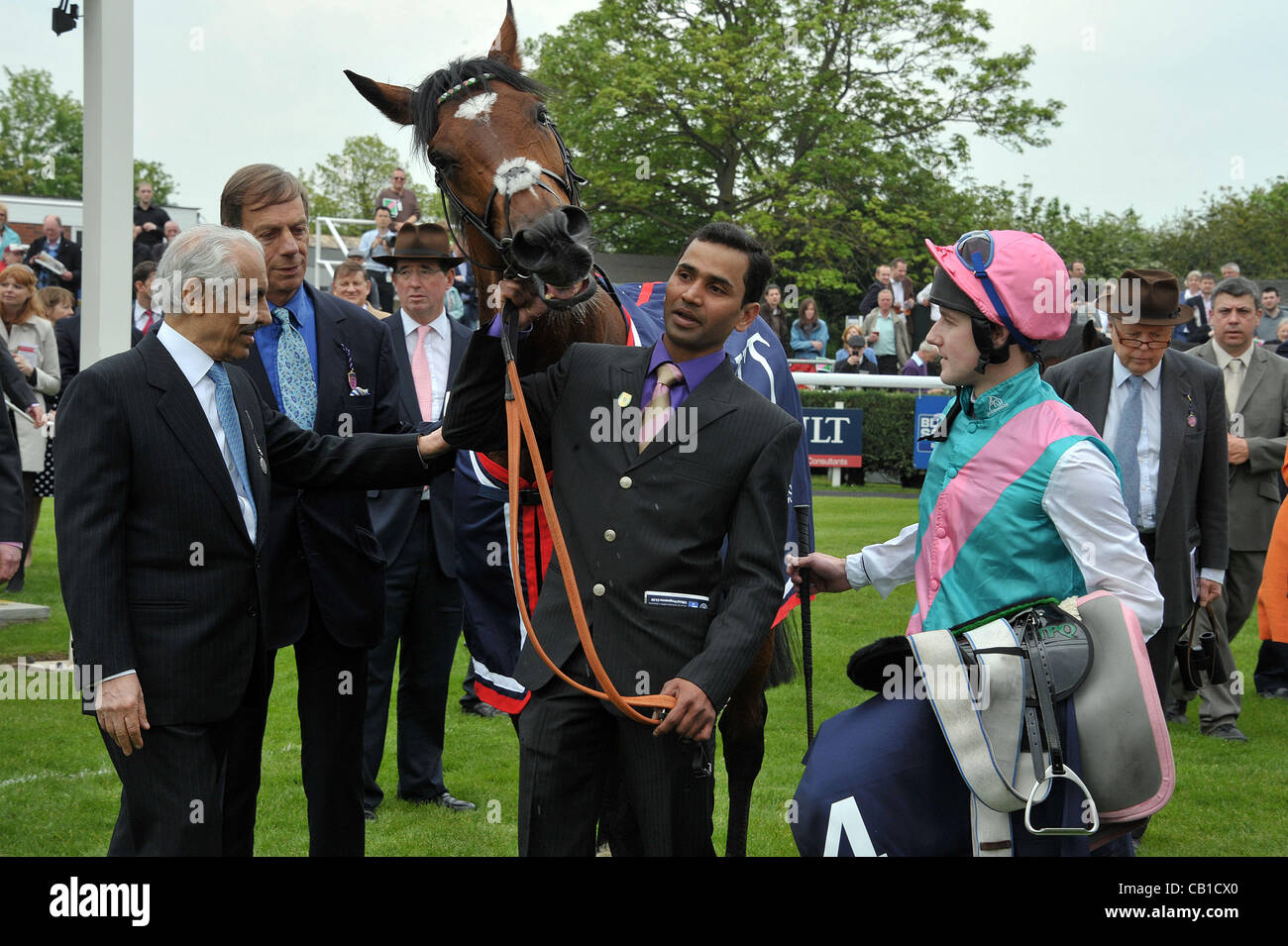 Khaled Abdulla, Sir Henry Cecil with Jockey Tom Queally and Frankel ...