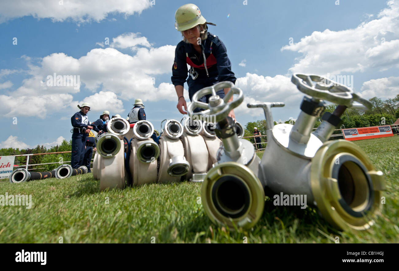 19.05.2012. Bienenbuettel, Germany. A fireman prepares for competition ...