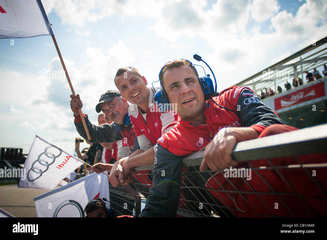 Audi Sport Team Phoenix pit crew crowd the front stretch to celebrate ...