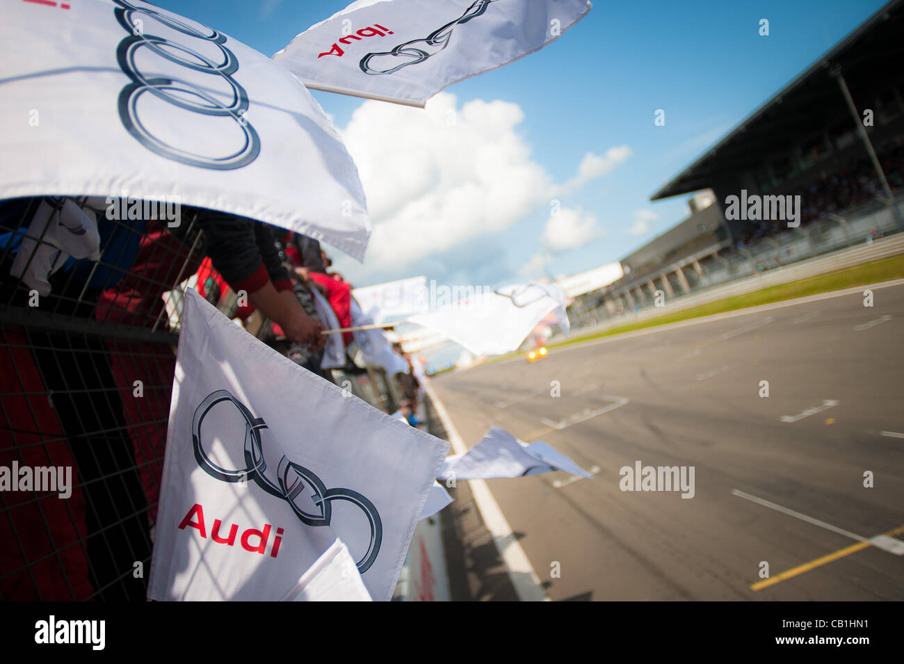Audi Sport Team Phoenix pit crew crowd the front stretch to celebrate ...
