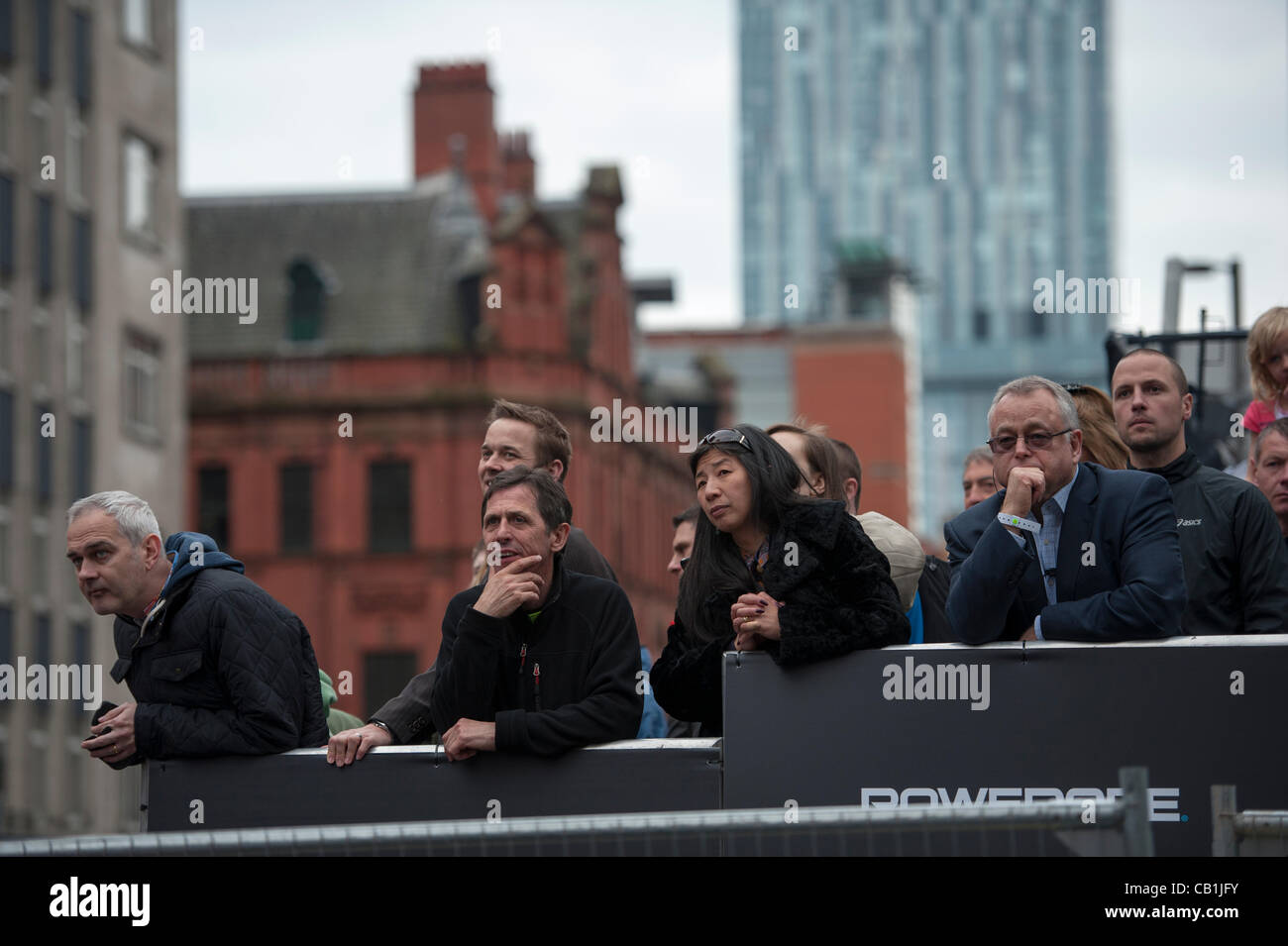 Crowds watch the athletes race in the Great City Games 2012 in ...