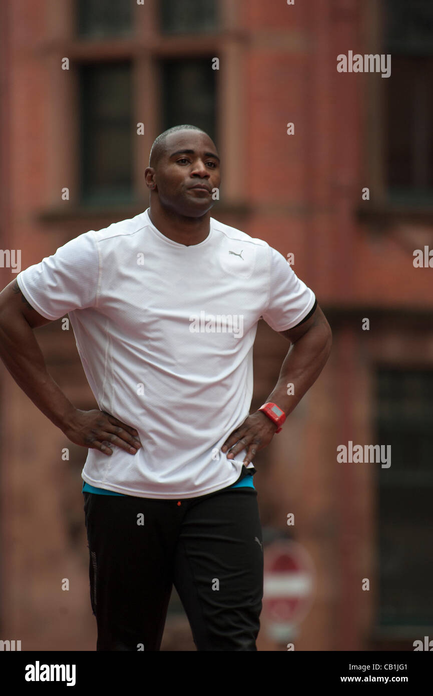British Athlete Mark Lewis-Francis warms up before a run at the Great ...