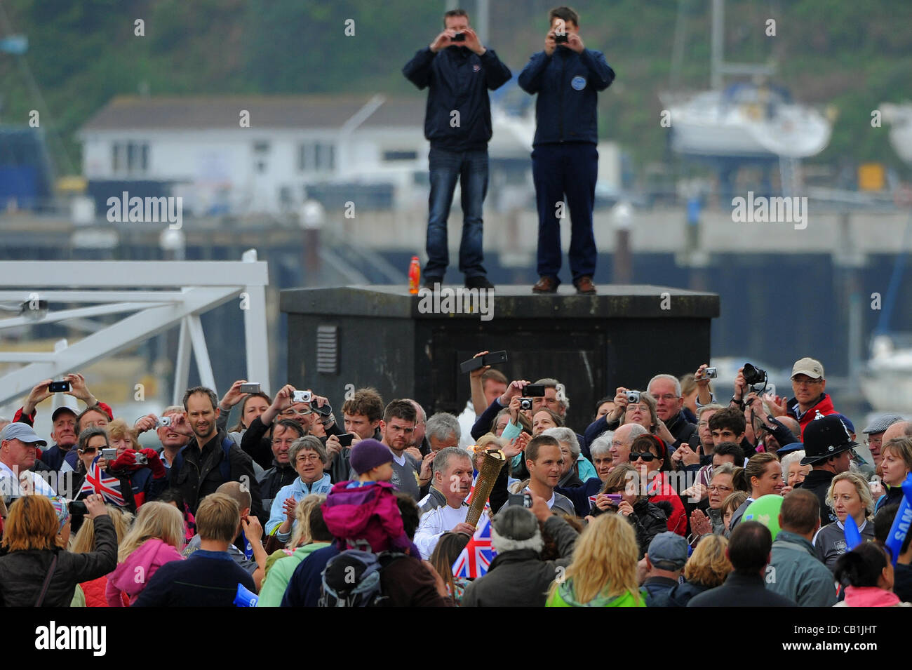 Dartmouth, UK. 20.05.12. OLYMPIC TORCH RELAY Olympic Torch bearer ...