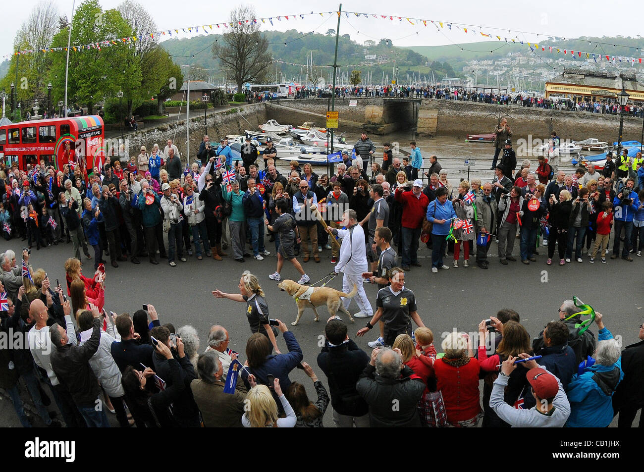 Dartmouth, UK. 20.05.12. OLYMPIC TORCH RELAY Olympic Torch bearer ...