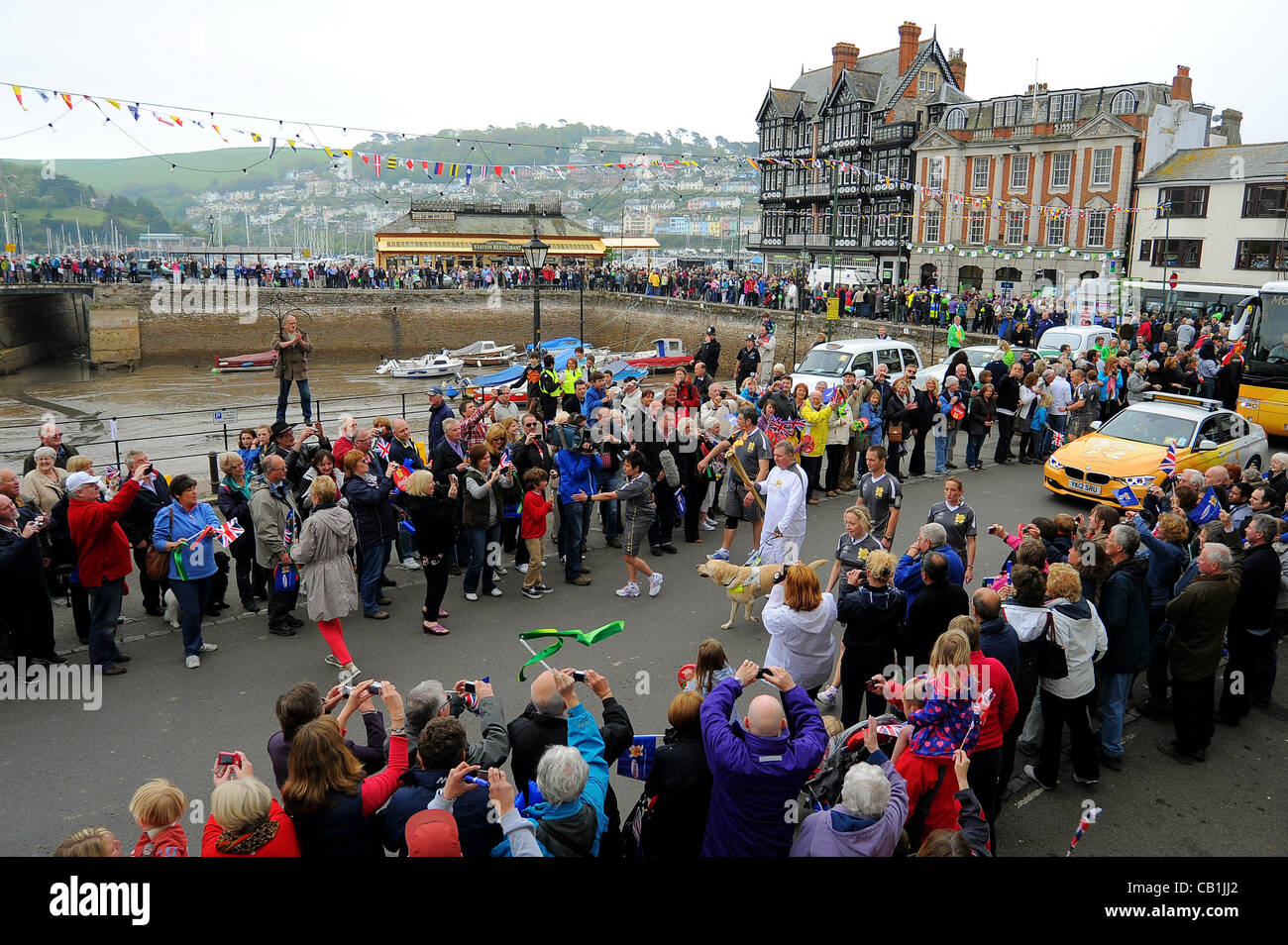 Dartmouth, UK. 20.05.12. OLYMPIC TORCH RELAY Olympic Torch bearer ...