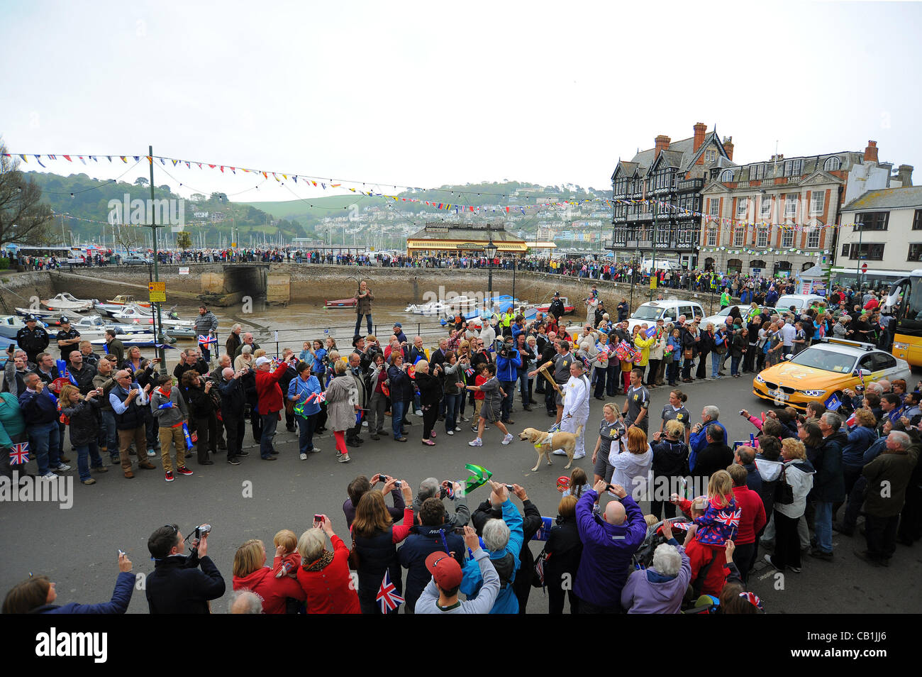 Dartmouth, UK. 20.05.12. OLYMPIC TORCH RELAY Olympic Torch bearer ...