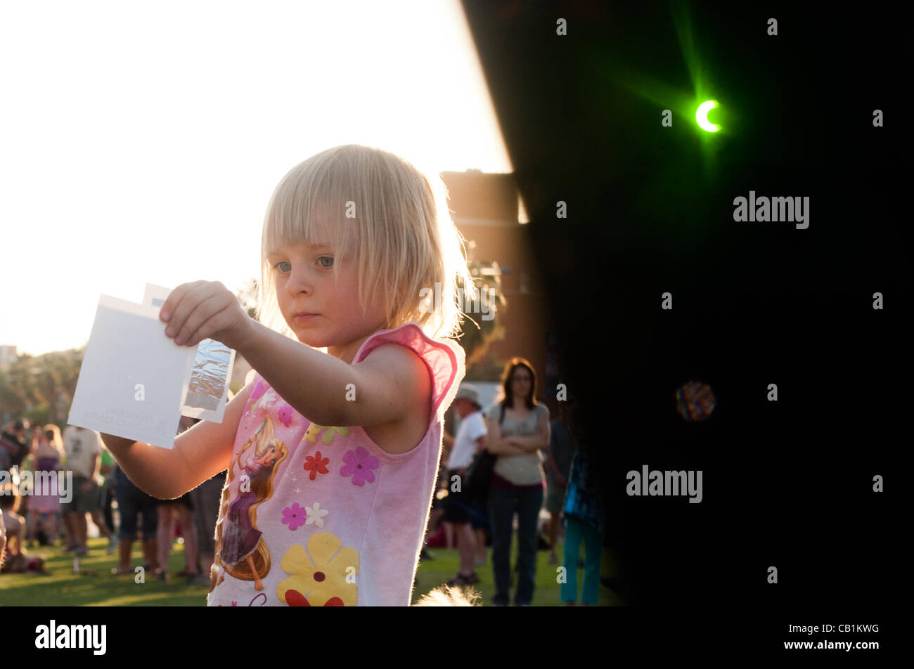 May 20, 2012 - Tucson, U.S - DYLAN HERRING watches the solar eclipse ...