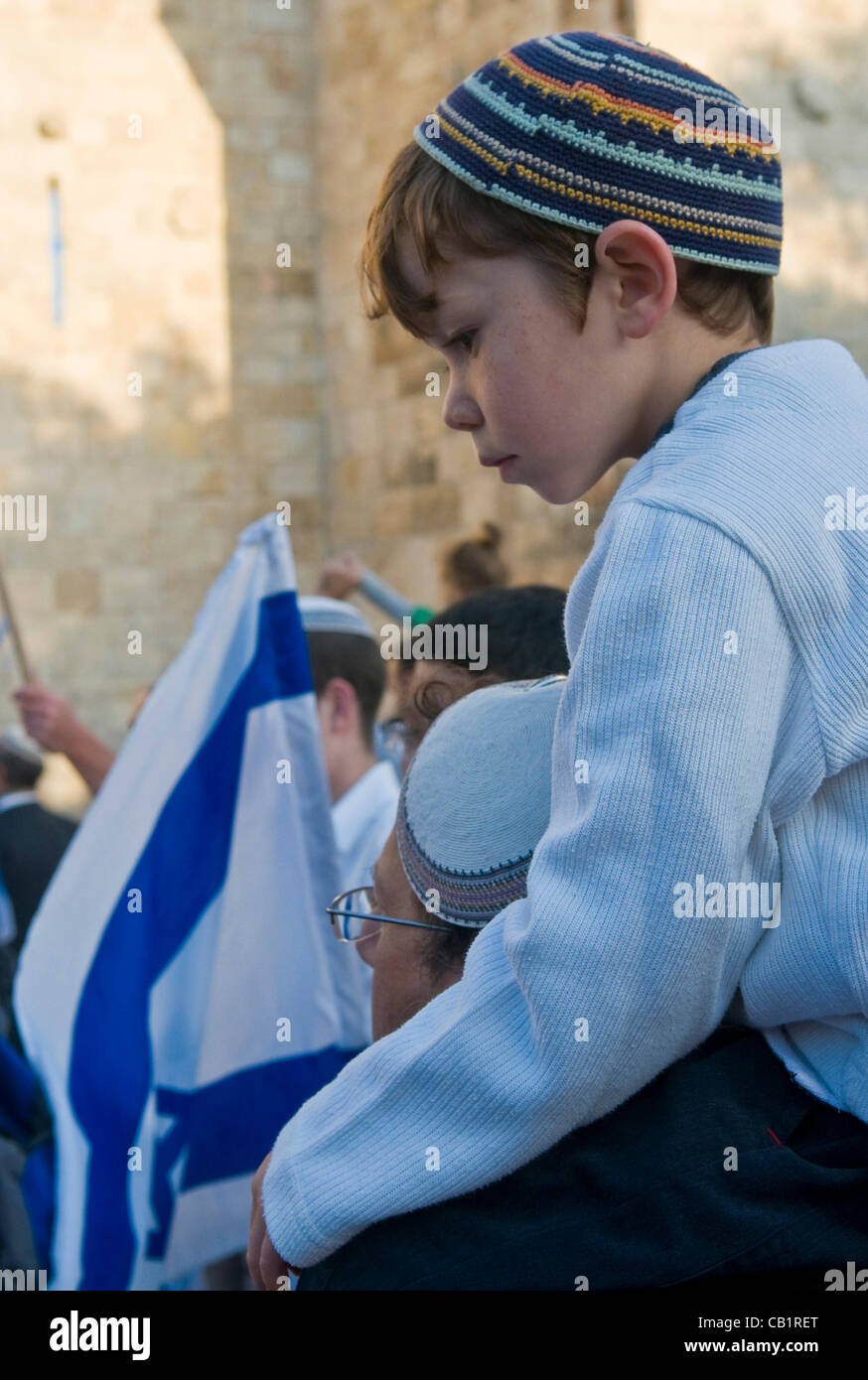 JERUSALEM - MAY 20 2012 : Right wing Israeli boy with his father on ...