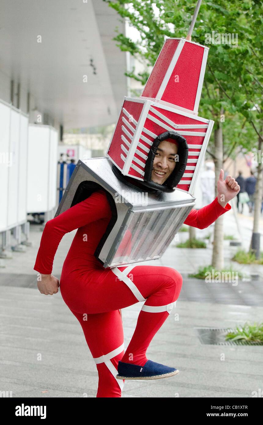 March 22, 2011, Tokyo, Japan - A man wears the Tokyo Tower costume ...