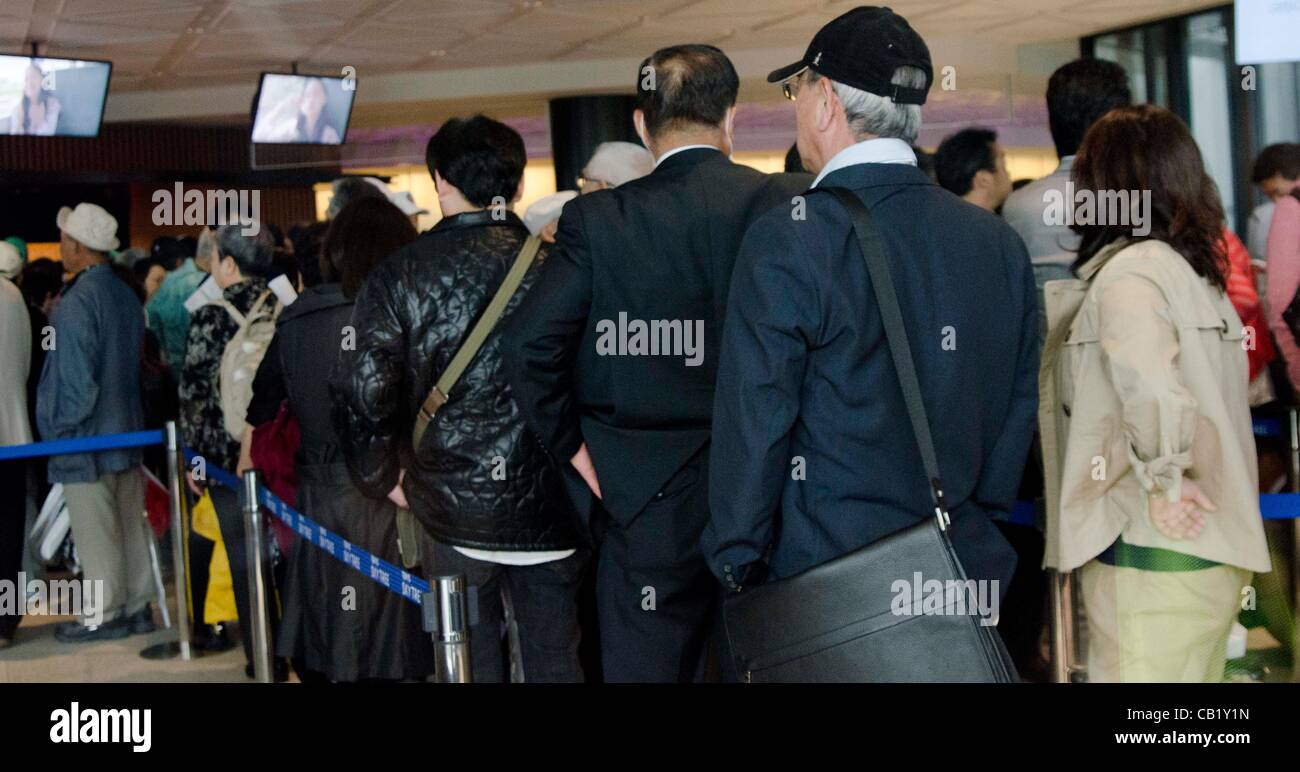 May 22, 2011, Tokyo, Japan - Visitors queue in line to have their ...