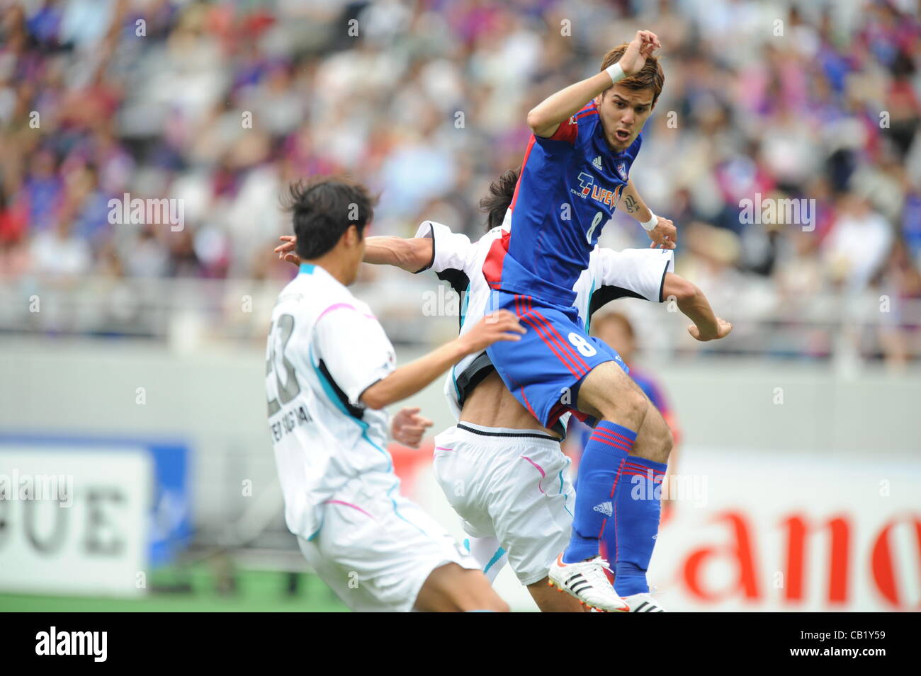 (R-L) Ariajasuru Hasegawa (FC Tokyo), and Yeo Sung-Hae (Sagan), MAY 20 ...