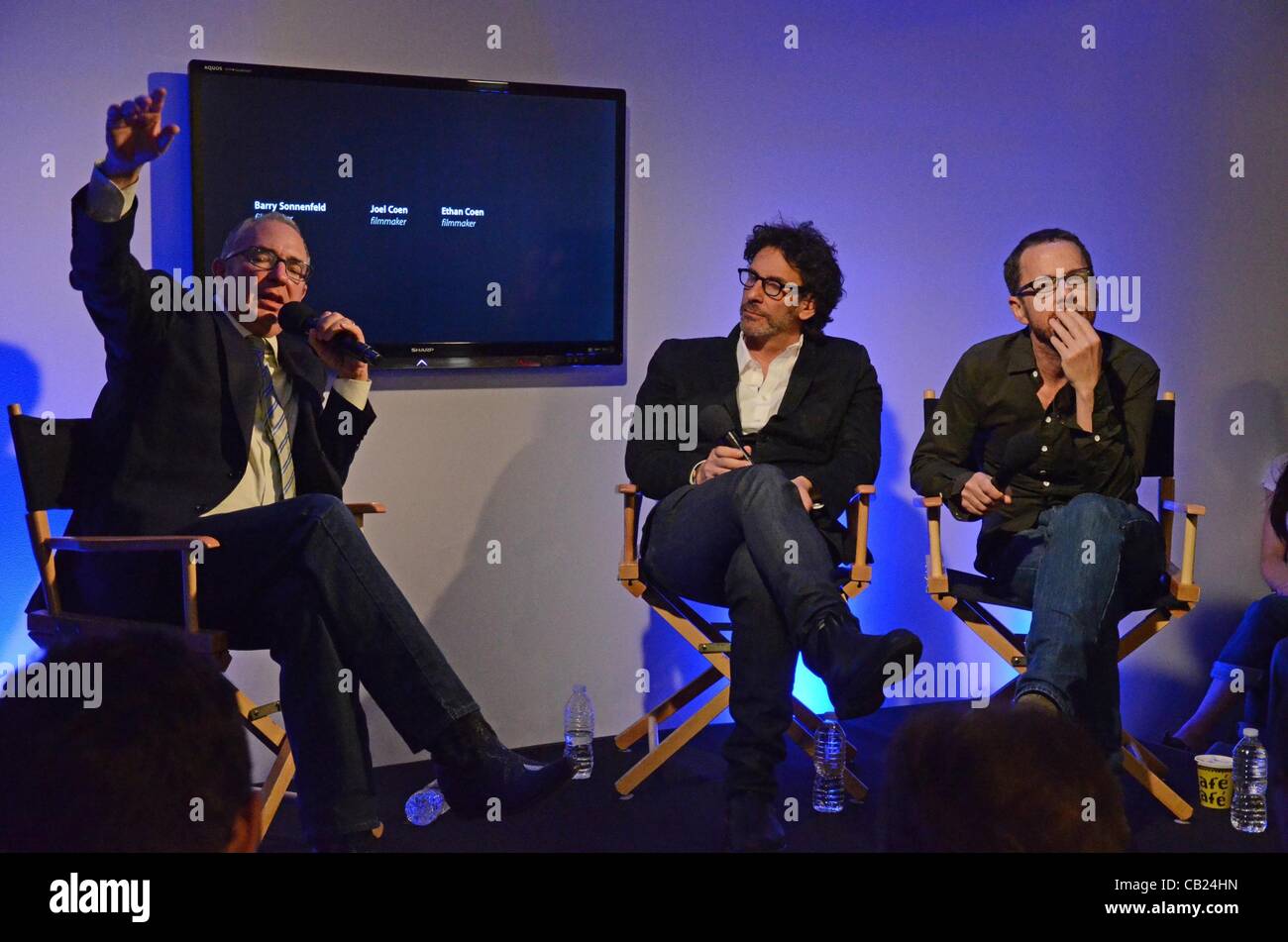 Barry Sonnenfeld, Joel Coen, Ethan Coen on stage for The Apple Store ...