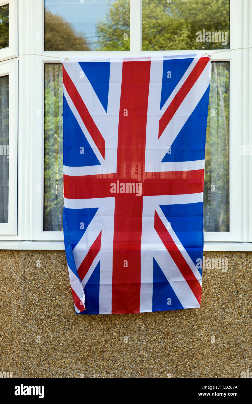 The Union Jack flag adorns window in Longwell Green, Bristol in ...