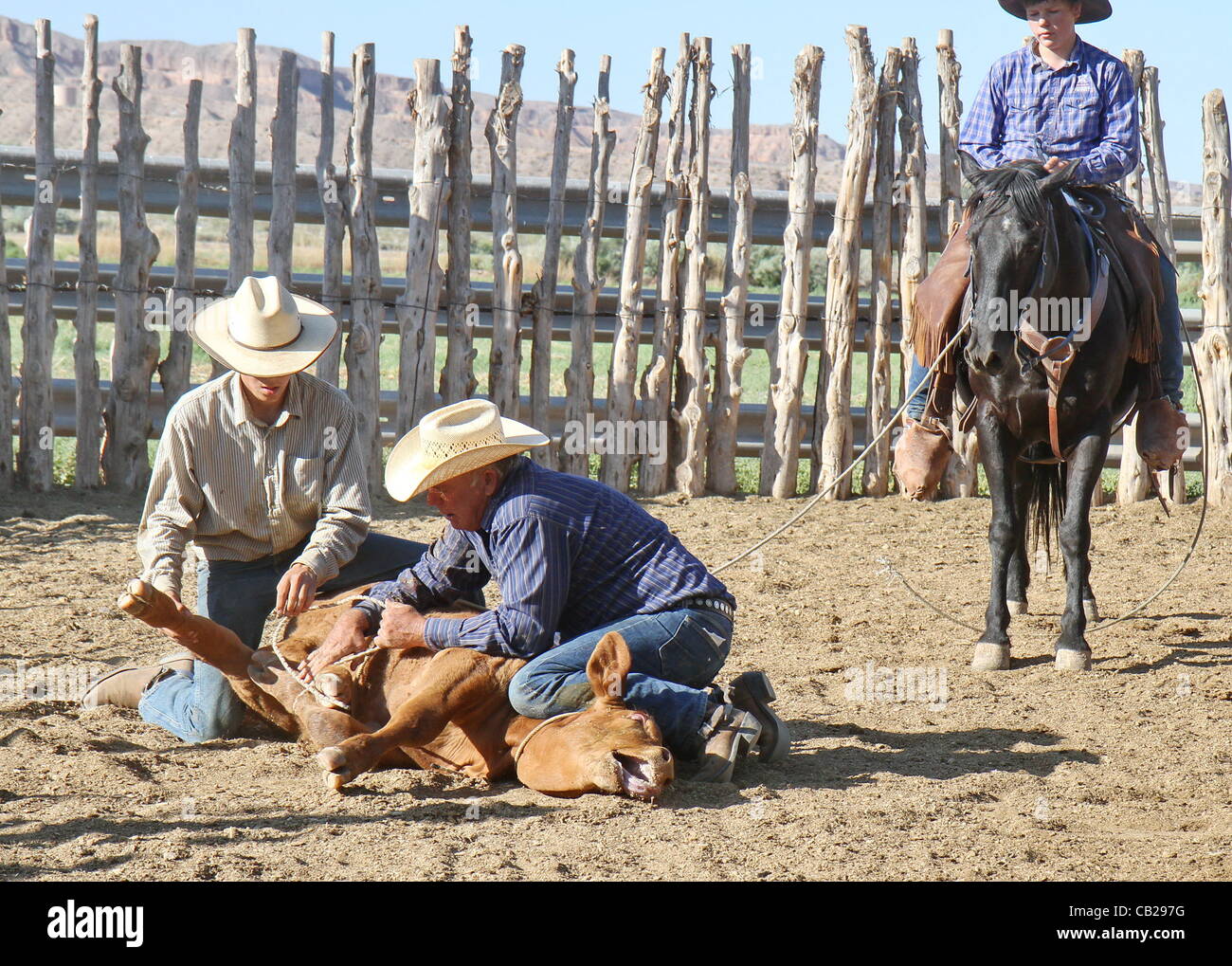 May 16, 2012 - Riverside, NV, U.S - Arden Bundy, 14, right, finishes ...