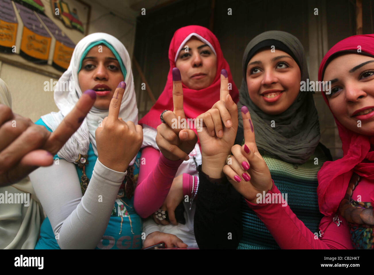 May 24, 2012 - Cairo, Egypt - Egyptian women show their ink-marked ...