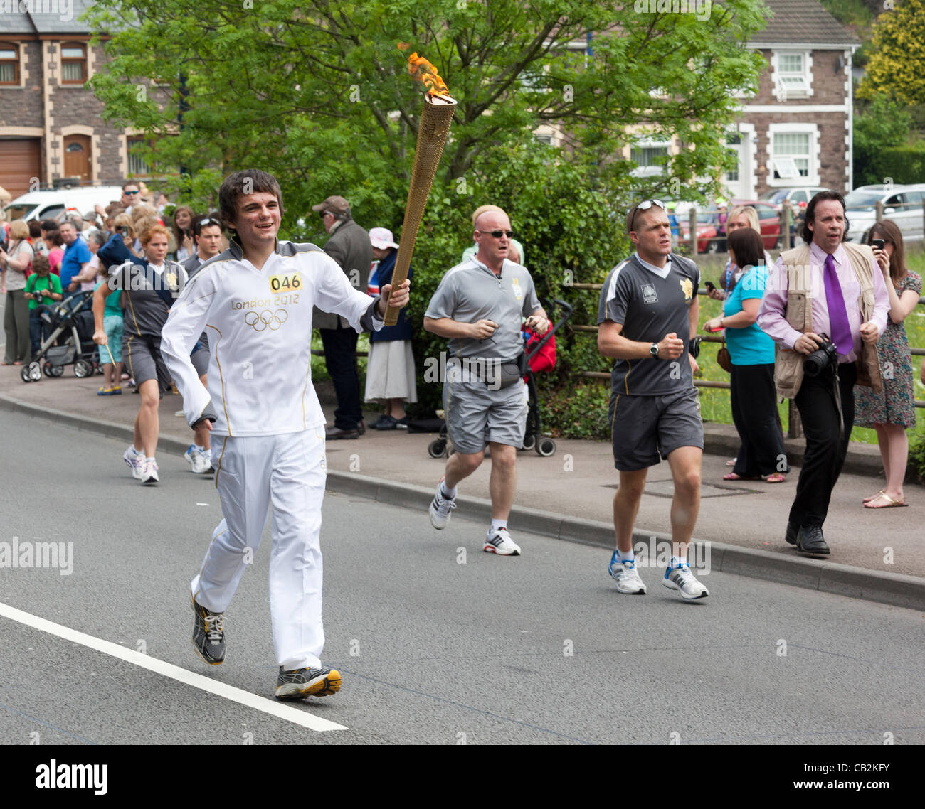 Sean Lewis age 16 from Llanbradach carryng the flame during the torch ...