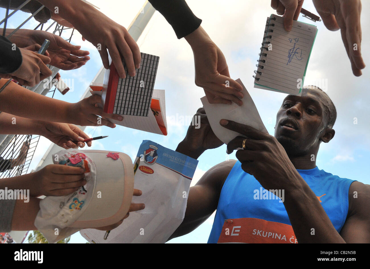 Athlete Usain Bolt (JAM) gives autographs to fans during Golden Spike ...