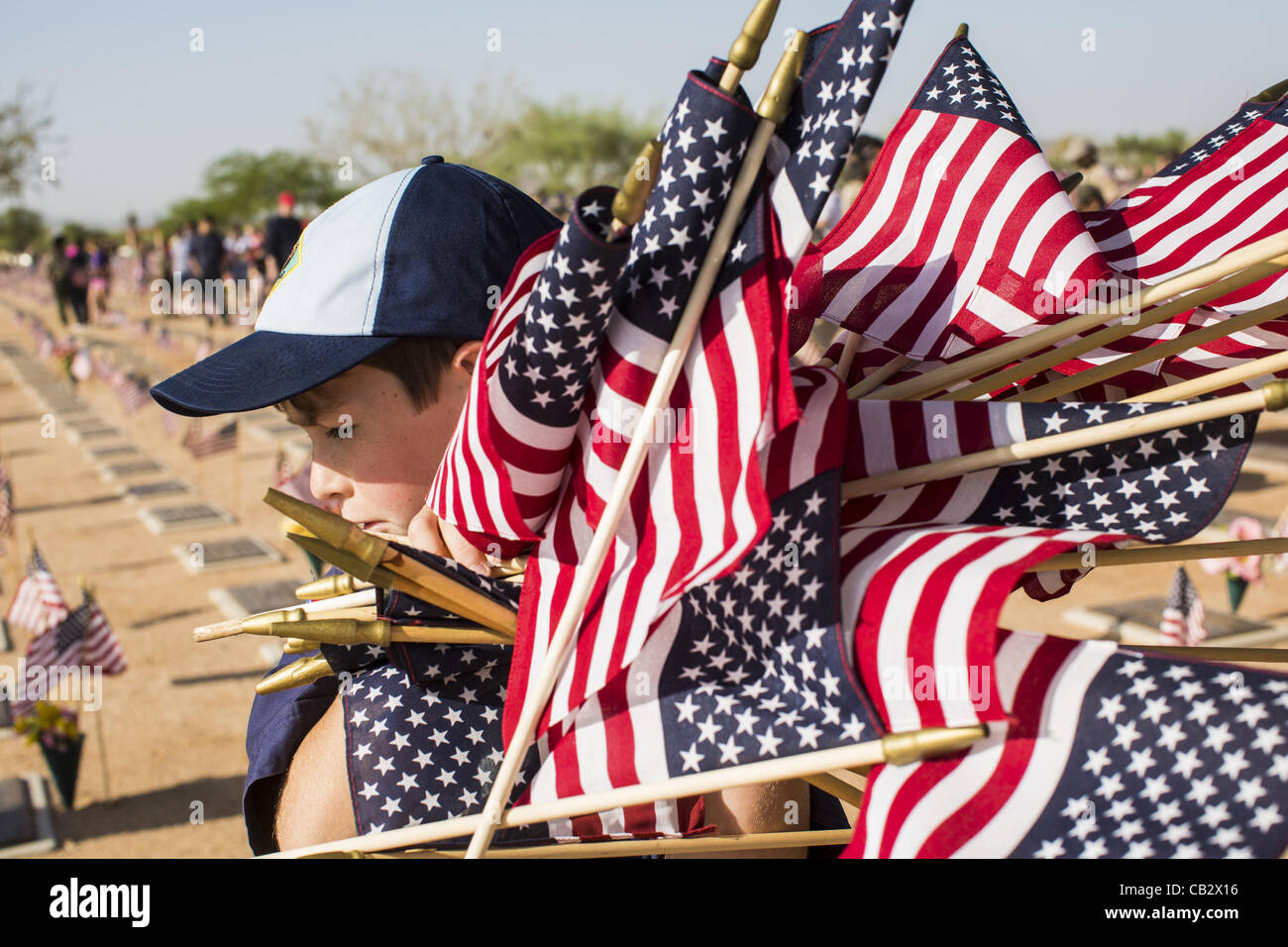 May 26, 2012 - Phoenix, Arizona, U.S. - A Cub Scout carries American ...