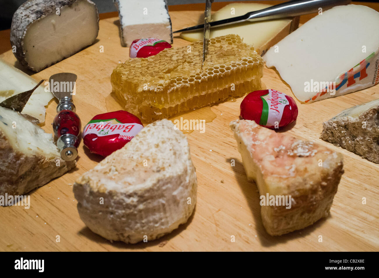 A platter of cheese and honey served in accordance with Jewish ...